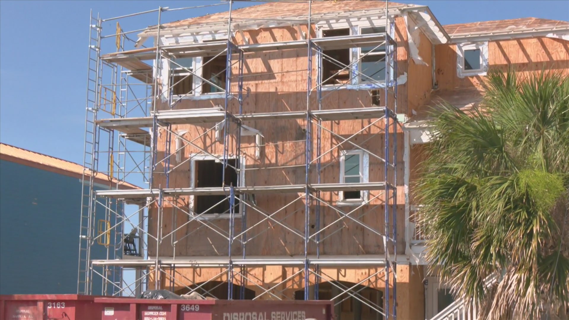 PCB tilted house leaves its mark: neighboring home begins demolition