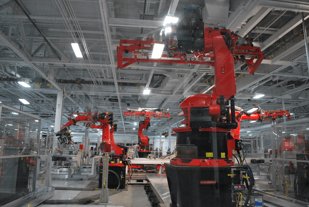 Tesla’s factory hangover is nudging cars toward robots