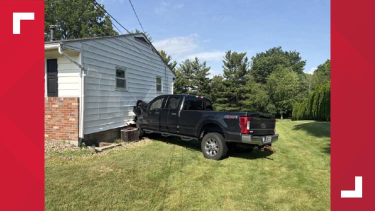 Man dies after crashing pickup truck into house amid medical emergency