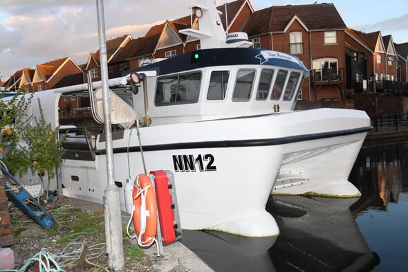A fishing boat pulled into a quiet English harbour - then armed police ...