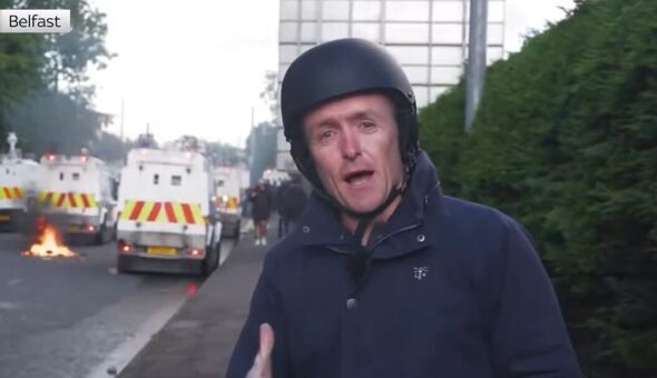 Sky News chaos as reporter ambushed in Belfast riot and live report ...