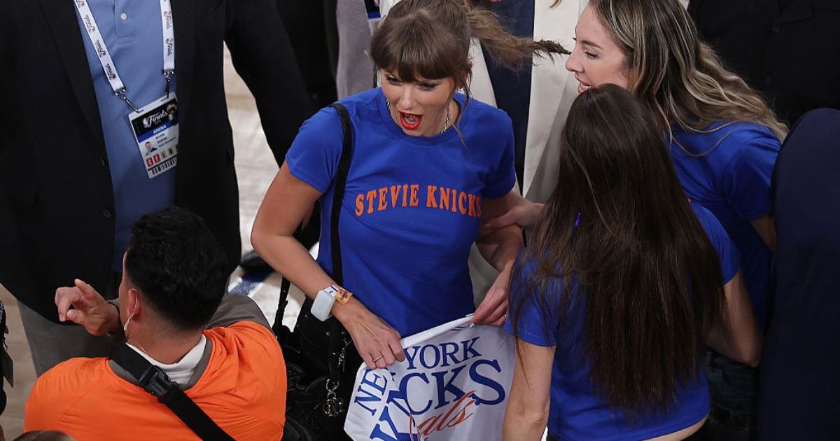 Taylor Swift brings thigh slit jeans & $4K Dior bag to courtside style