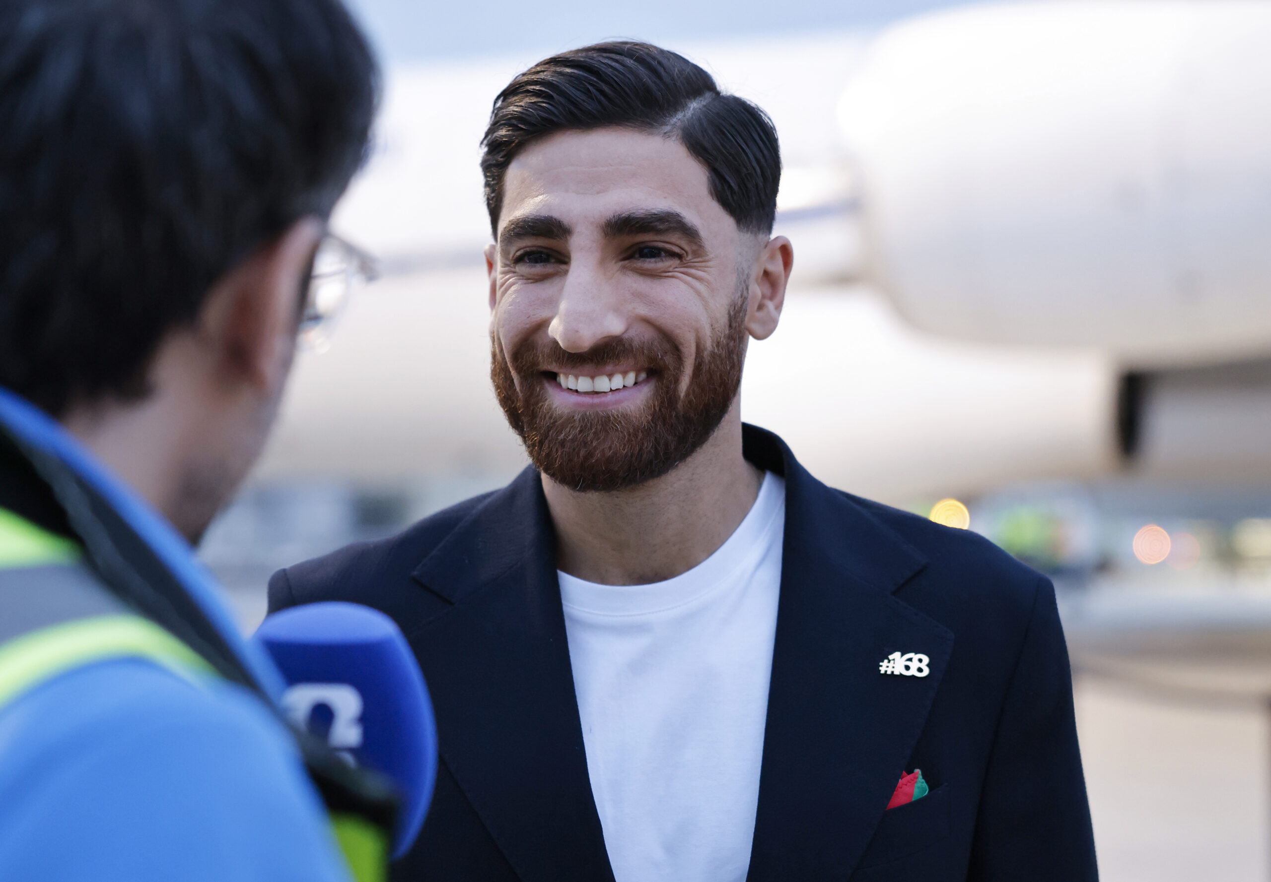 Reason Iran footballers were wearing #168 badges as they landed for the ...