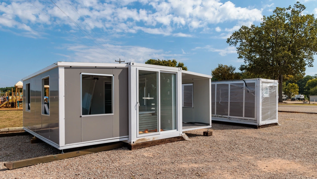 Mini House camper expands from compact tow to roomy cabin