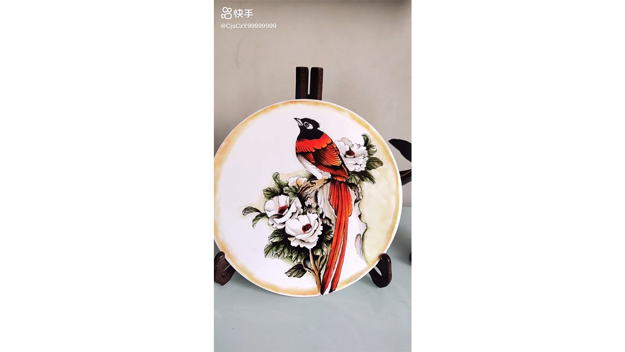 Elegant bird painting on decorative plate with scarlet red feathers and ...