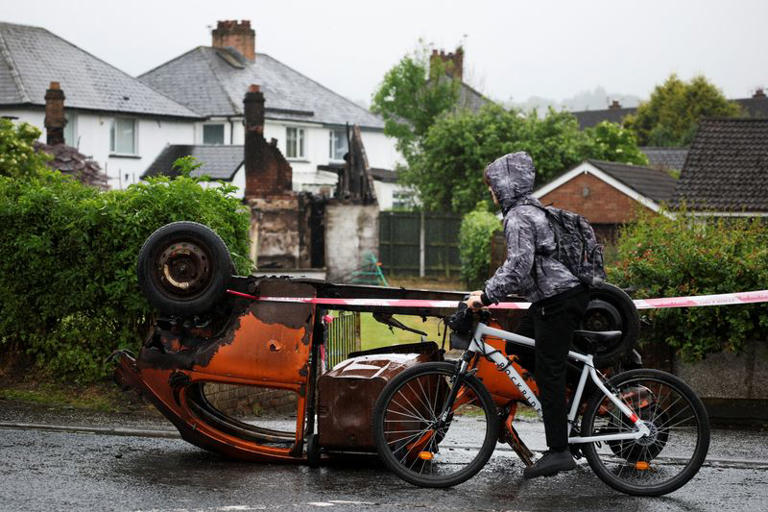 UK minister says violence in Northern Ireland is racist thuggery
