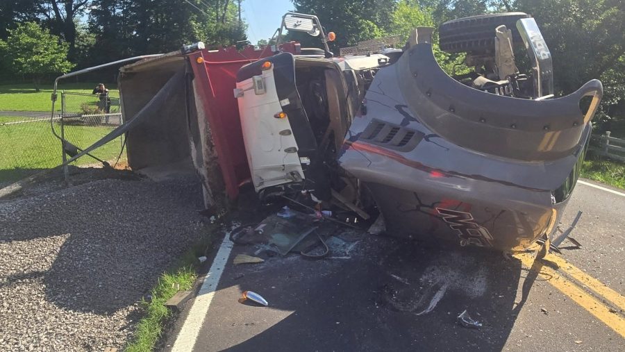 Dump truck overturns in West Knox County, spilling 21 tons of rock