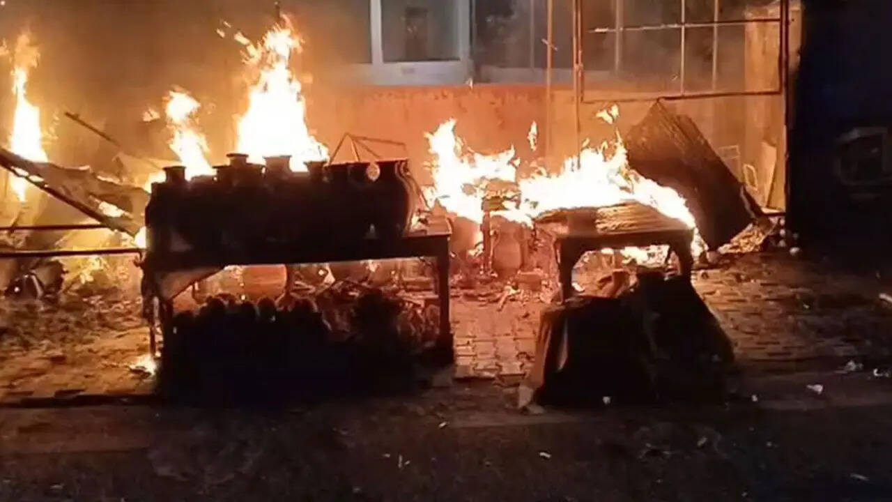 Building partially collapses after massive fire engulfs factory in ...