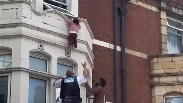 Toddler dangling from window ledge rescued in East London