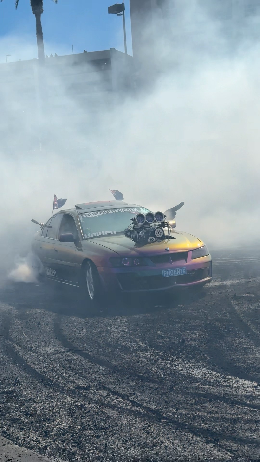Pontiac G8 spins donuts through thick smoke