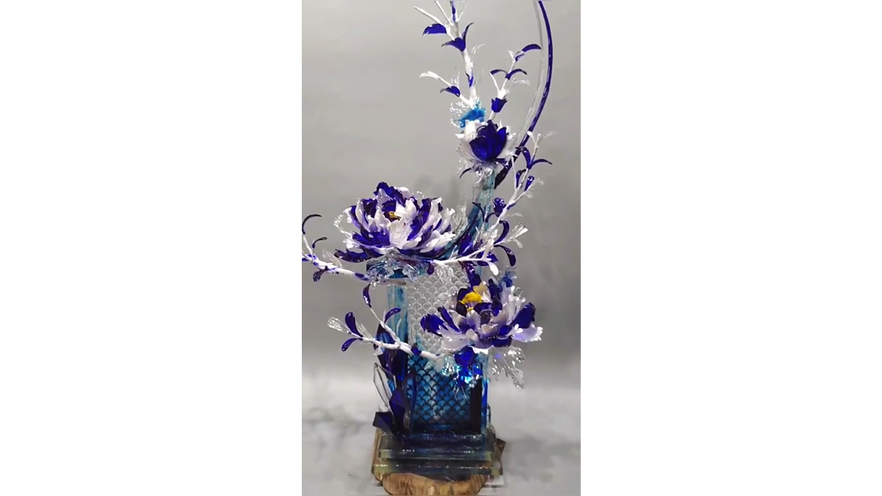 Elegant glass flower sculpture with sapphire blue petals and crystal ...