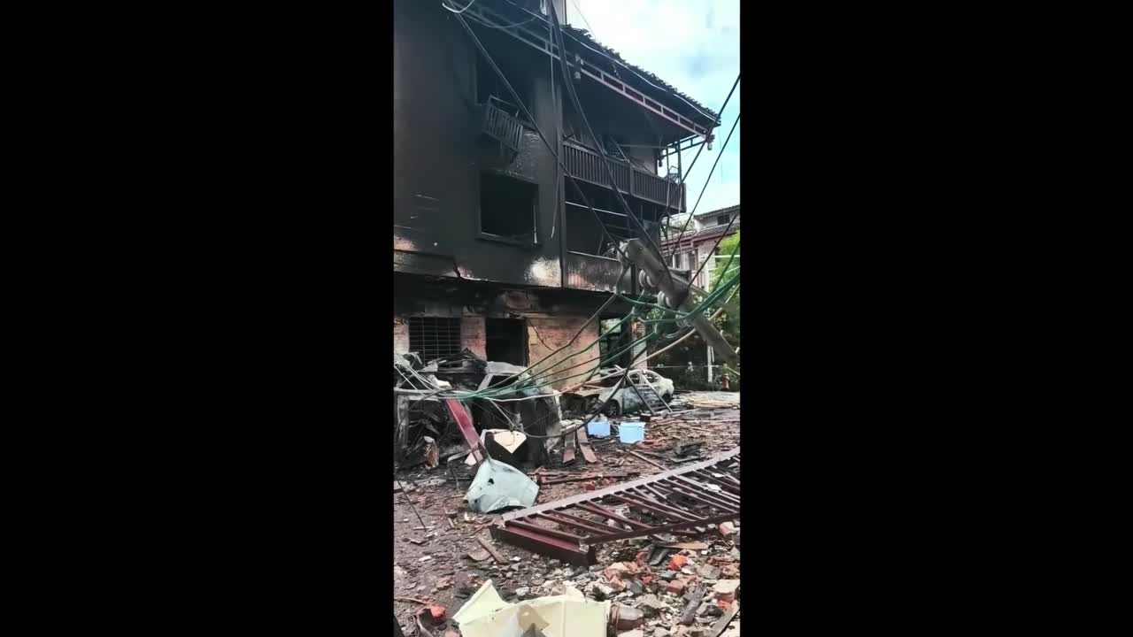Building charred after explosion that killed 7 in China