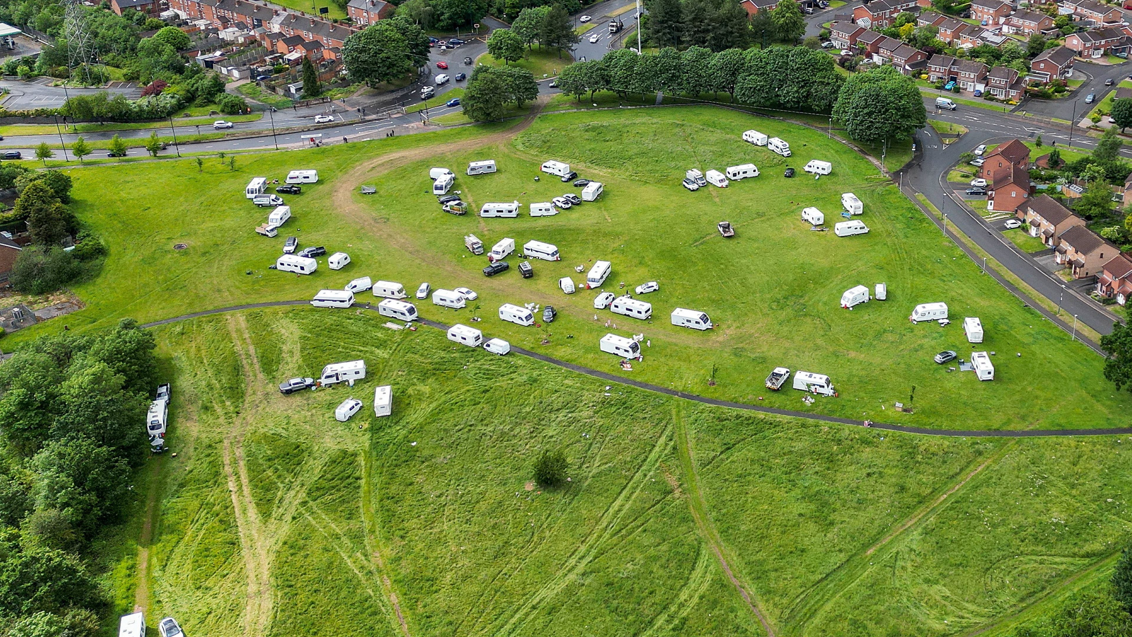 Traveller group of 40 caravans set up illegal camp near Asda