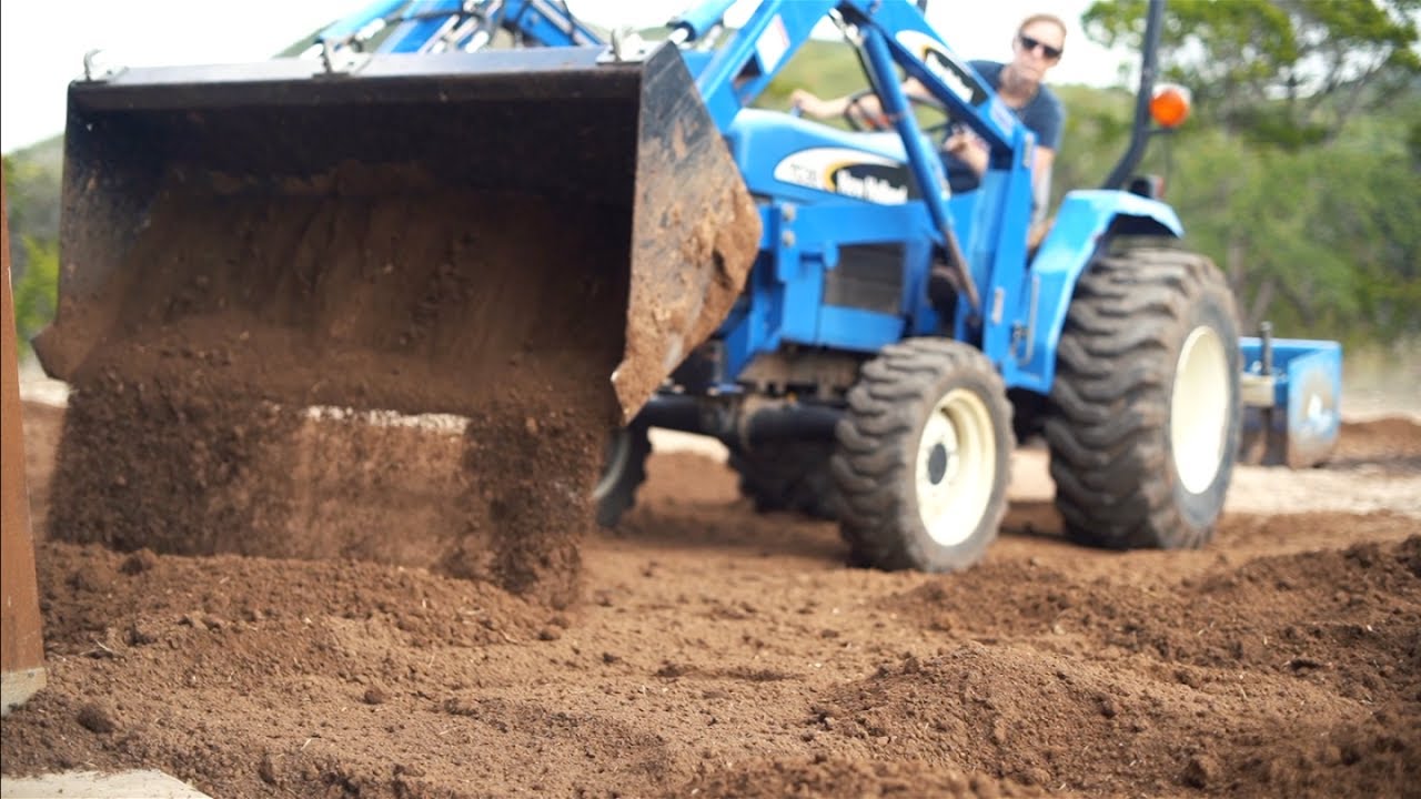 Transform your backyard by grading massive amounts of dirt