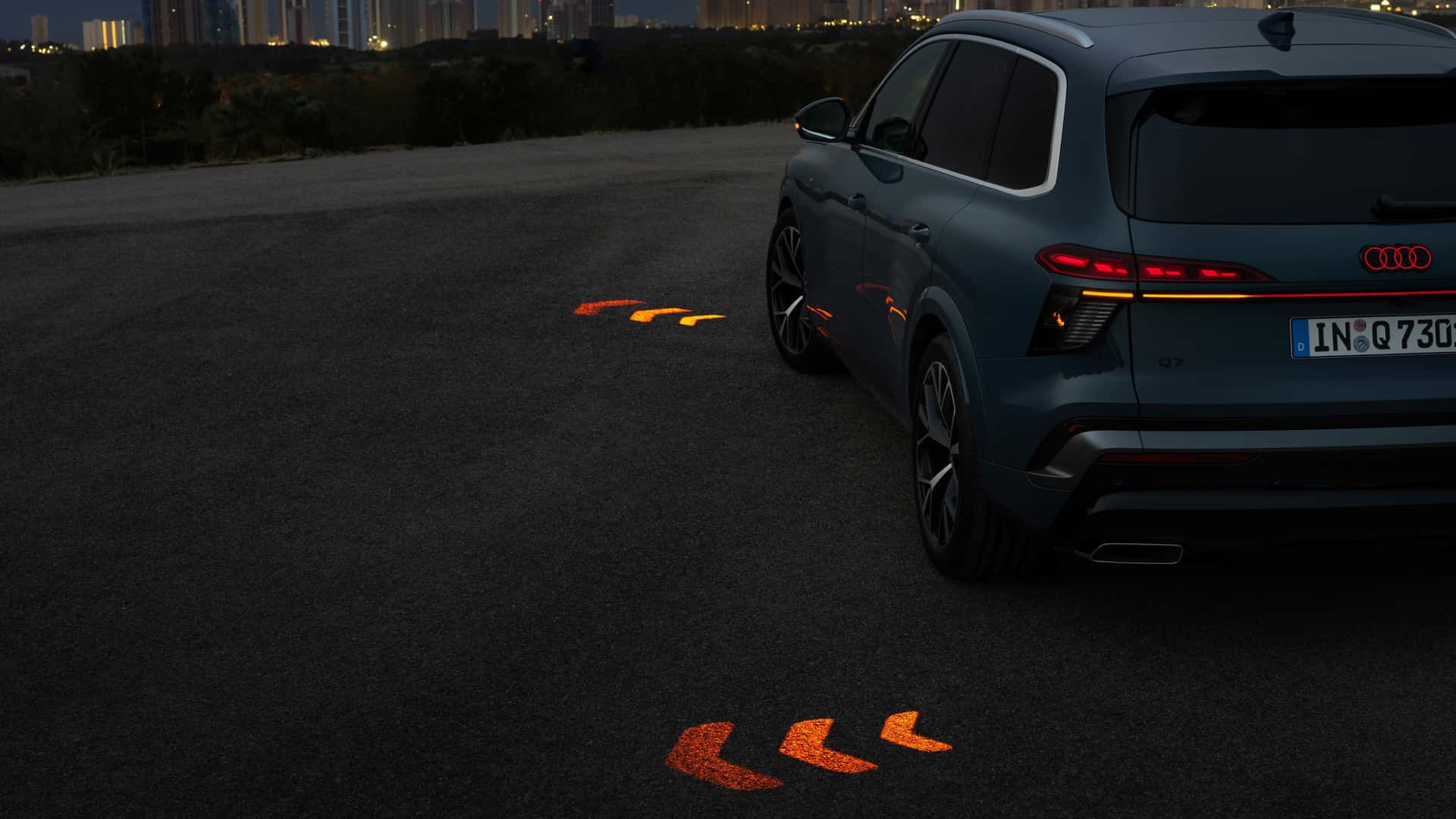 The new Audi Q7 projects turn signals onto the road