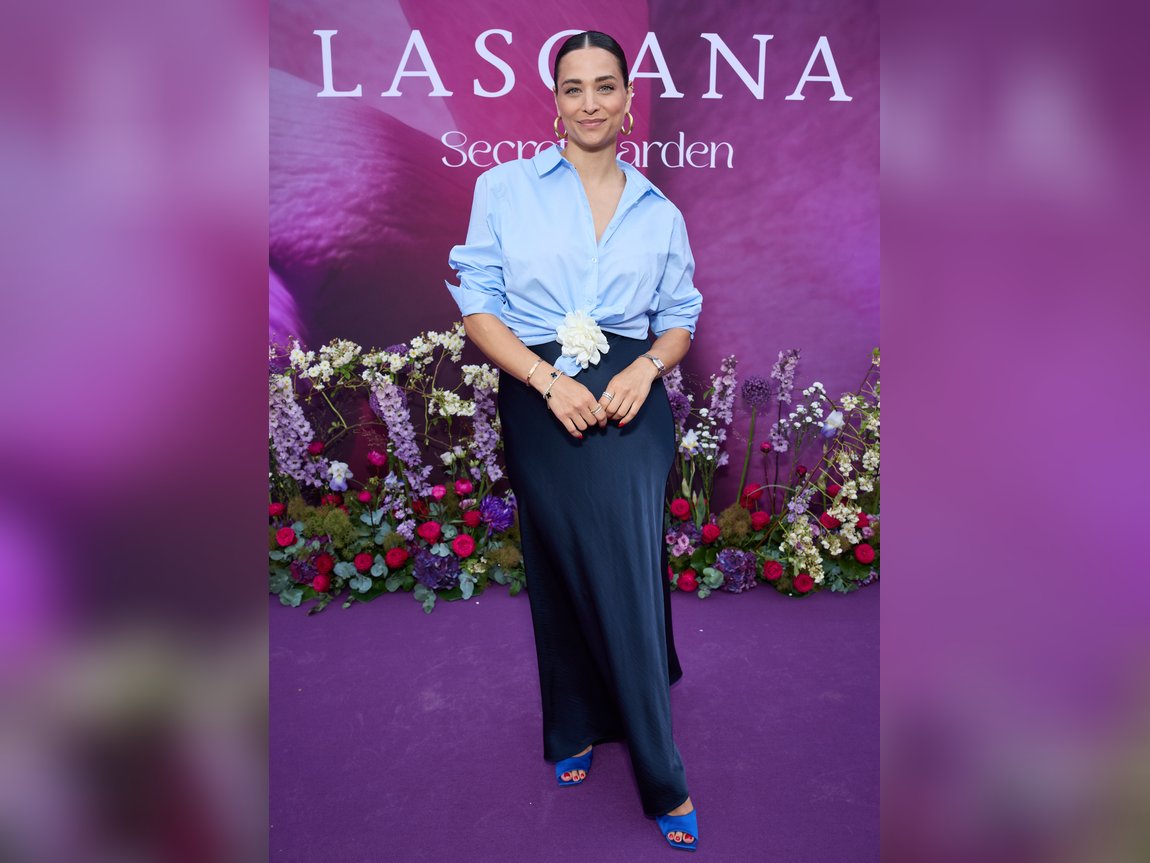 Amira Aly beams with baby bump at the Lascana fashion show in Hamburg
