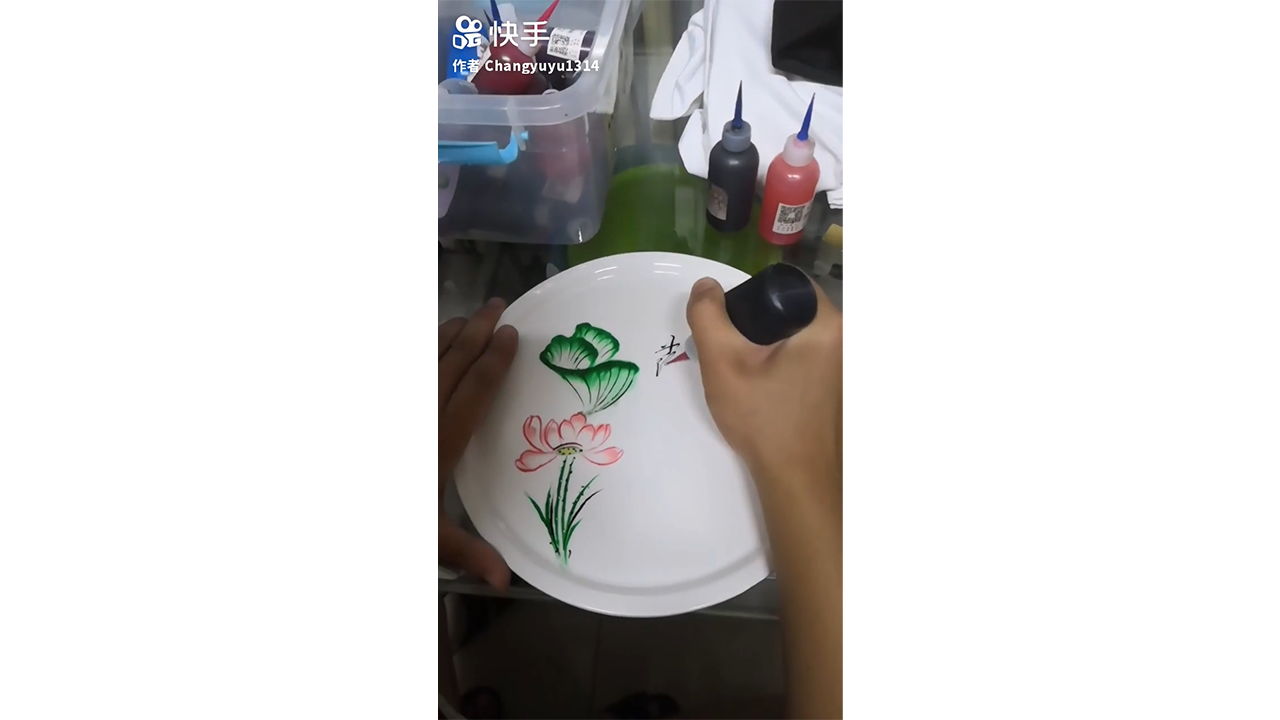 Traditional lotus flower painting on ceramic plate with elegant green ...