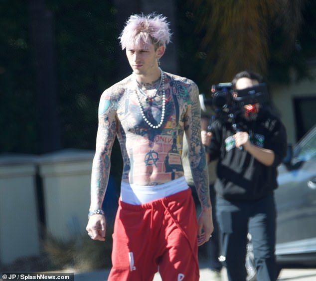 Machine Gun Kelly details intense side effects of blackout tattoo