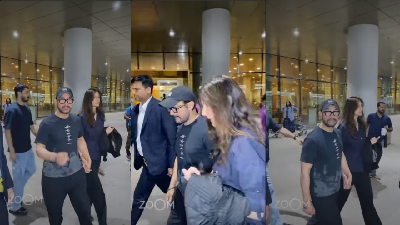 Aamir Khan holds onto girlfriend Gauri Spratt's hand while arriving ...