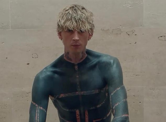 Machine Gun Kelly details intense side effects of blackout tattoo