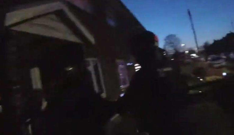 Footage reveals moment drug dealer arrested after hiding in kitchen at ...