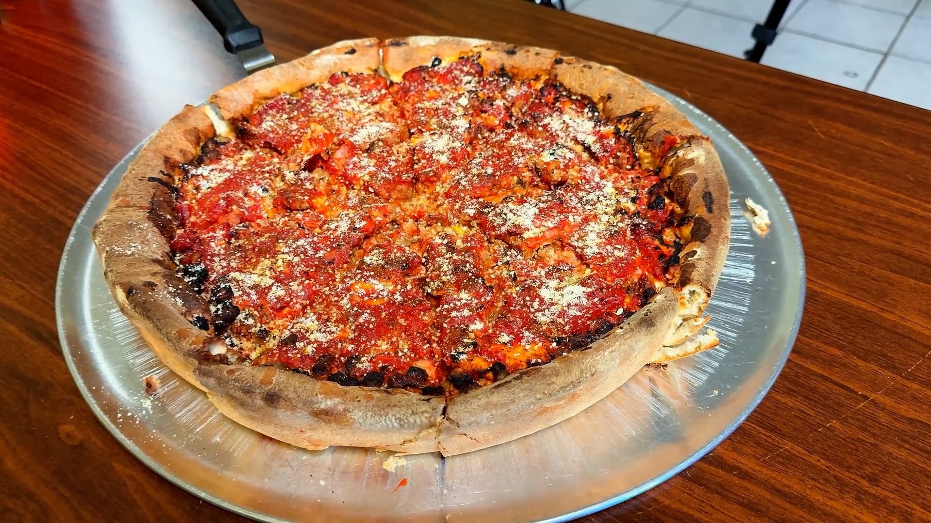 Man tries to conquer one of the cheesiest pizza challenges ever created
