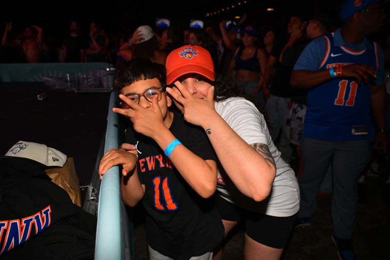 See it | Queens residents come together to watch Knicks’ historic ...