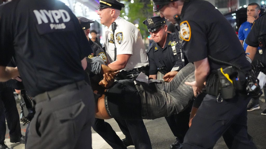 More than a dozen face charges after rowdy crowd takes over streets ...