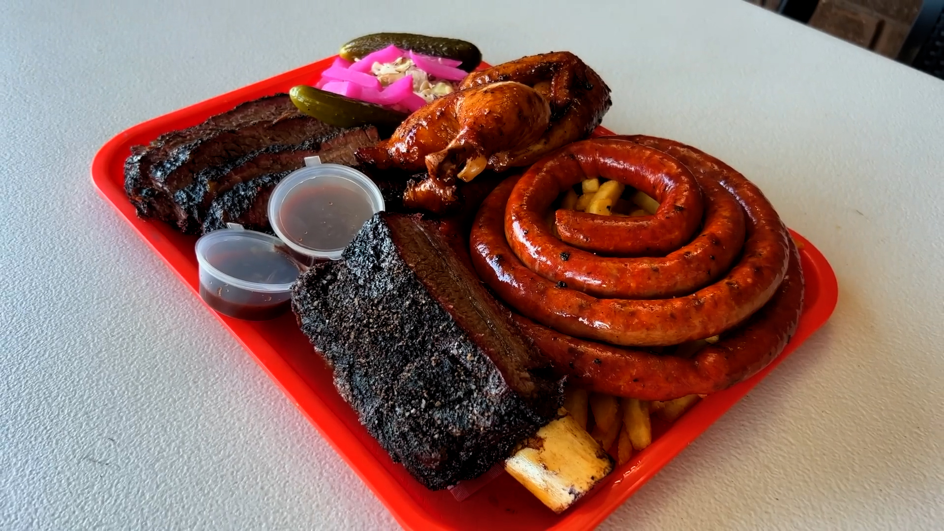 Woman tries to conquer Australia’s biggest BBQ platter in one hour