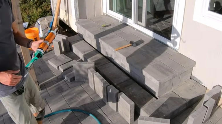 Homeowner transforms entryway with stairs made entirely from concrete ...