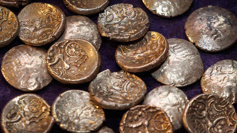 Why do we toss coins into fountains?