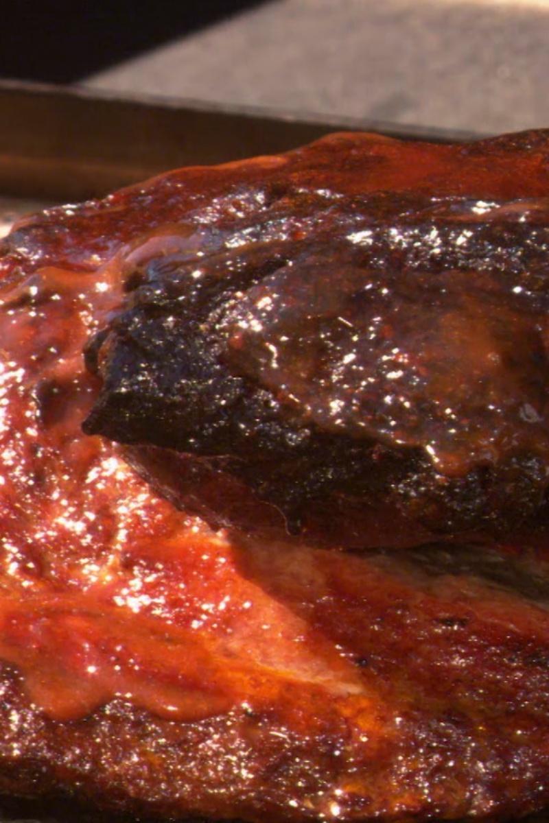 Slow smoked pork butt with mop sauce