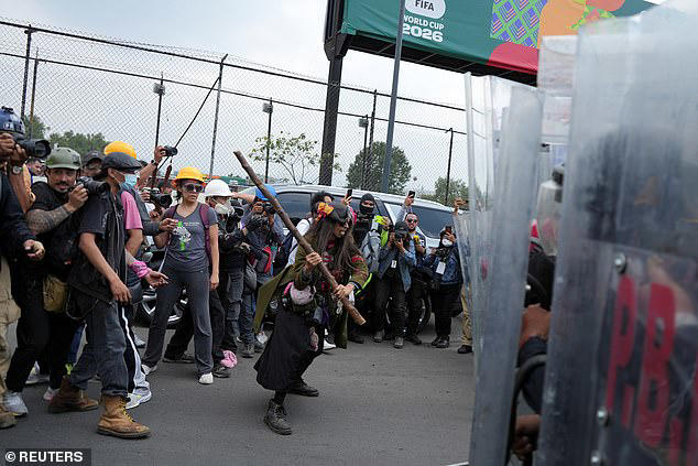 Chaos erupts outside Mexico City World Cup stadium as protesters fight ...
