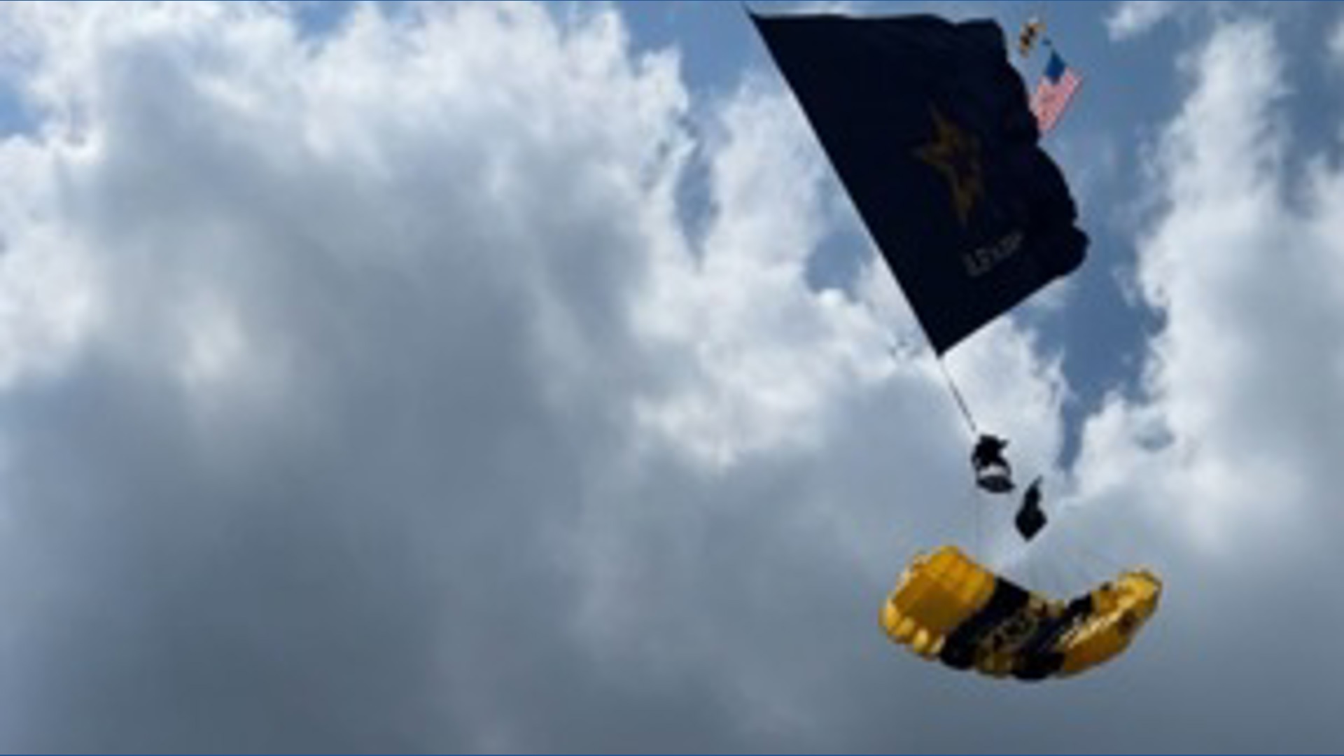 Army skydivers landing in the National Mall