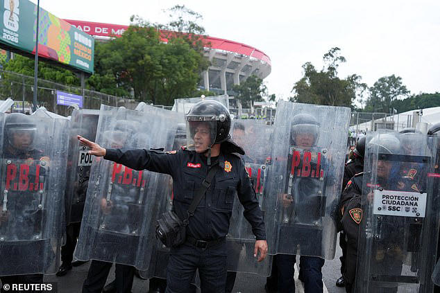Chaos erupts outside Mexico City World Cup stadium as protesters fight ...