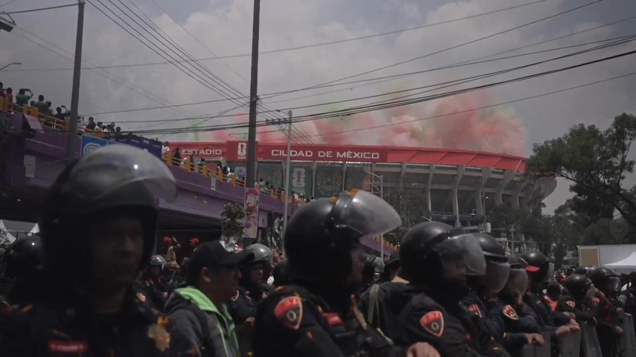 Families of Mexico's missing march for answers on World Cup opening day