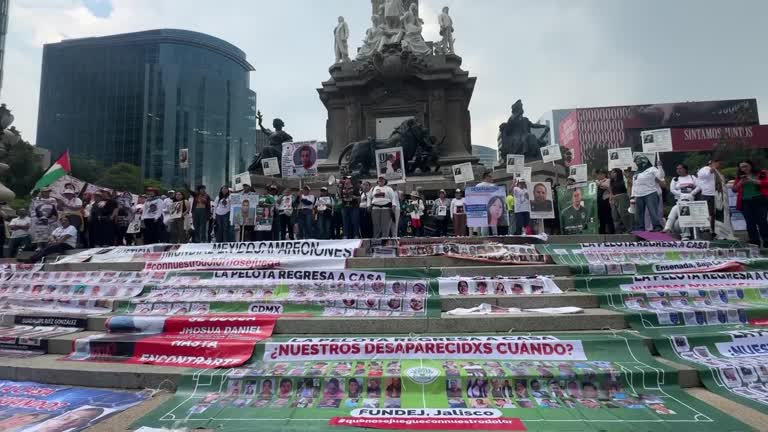 Refile: Relatives of missing persons demonstrate as fans celebrate ...
