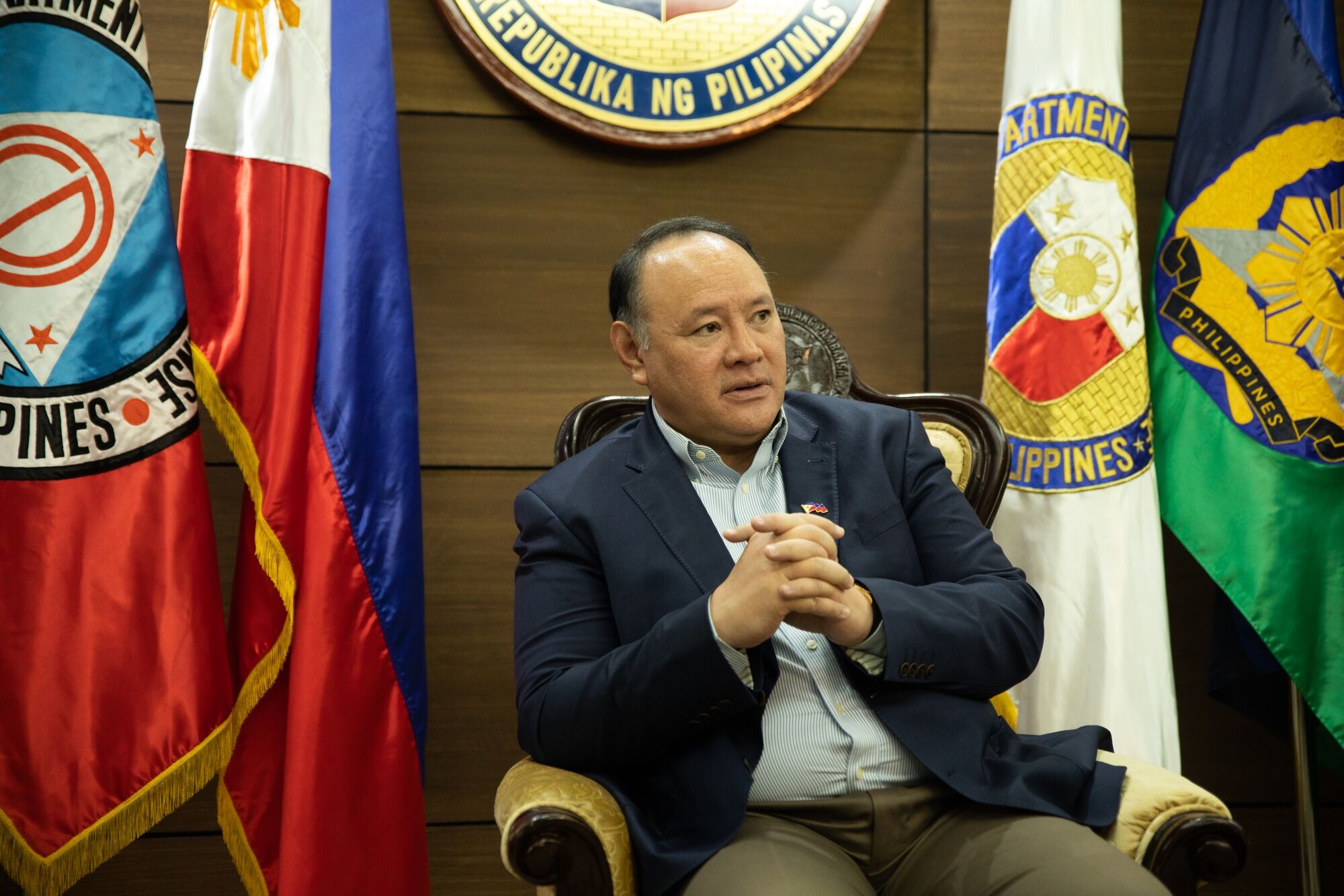 China escalates feud with Philippines by banning defense chief