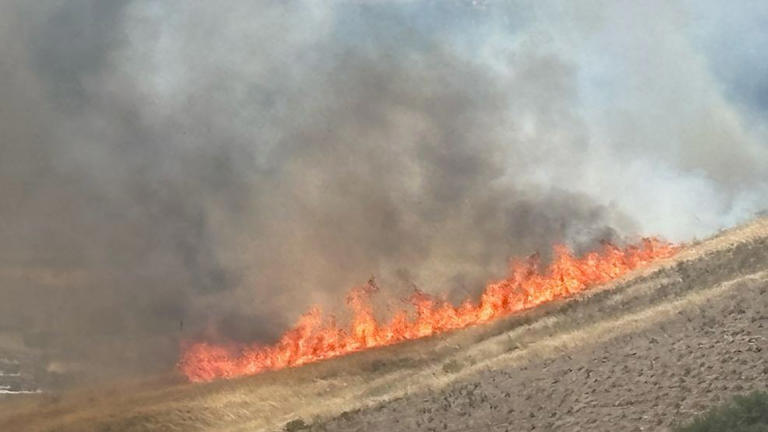Grass fire ignited in Salt Lake homeless encampment fully contained ...
