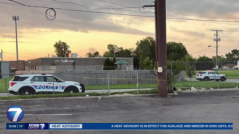 Police investigate after woman's body found behind dumpster