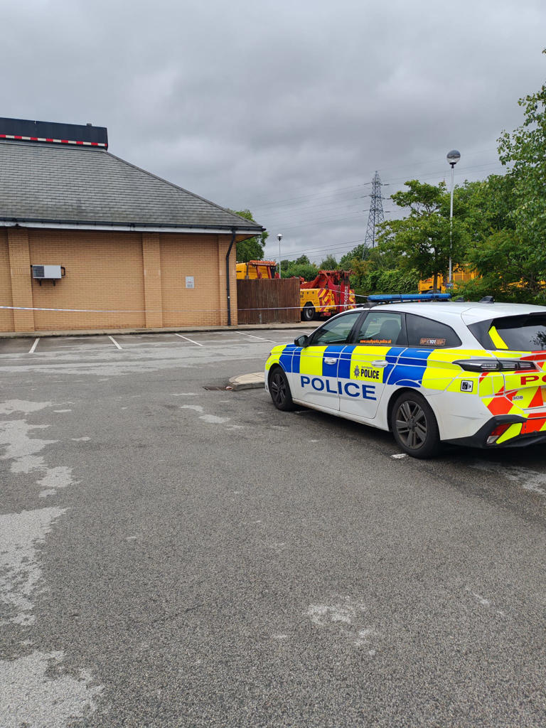 Latest pictures show scene this evening after body found in former ...