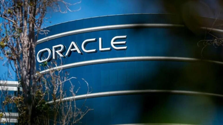 Oracle shares plunge 13% to 4-week low as AI-driven spending plans ...