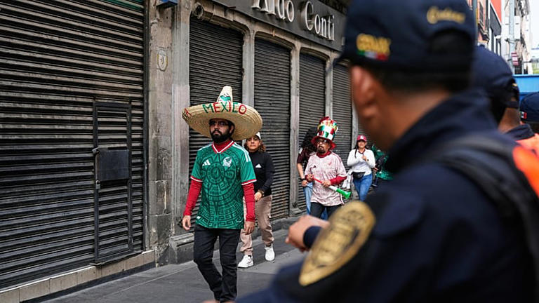 Fans descend on Mexico City stadium ahead of World Cup kickoff
