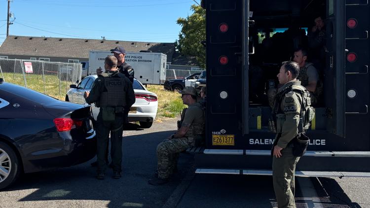 Officer shoots man armed with weapon while responding to 911 call ...