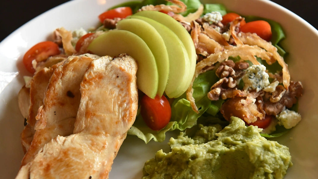 15 high-protein salads featuring meat, seafood, and plant-based options