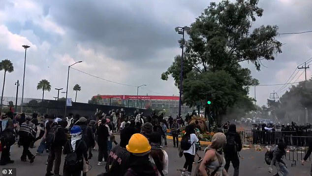 Chaos erupts outside Mexico City World Cup stadium as protesters fight ...