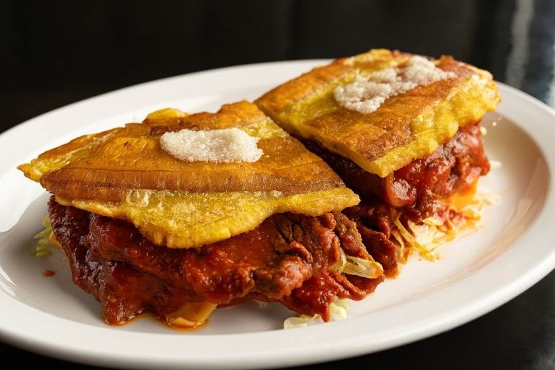 This Illinois sandwich replaces bread with fried plantains and asks why ...
