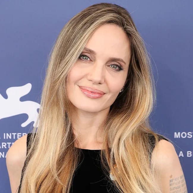 'She looks so cute': Angelina Jolie wears a black satin top and flats ...