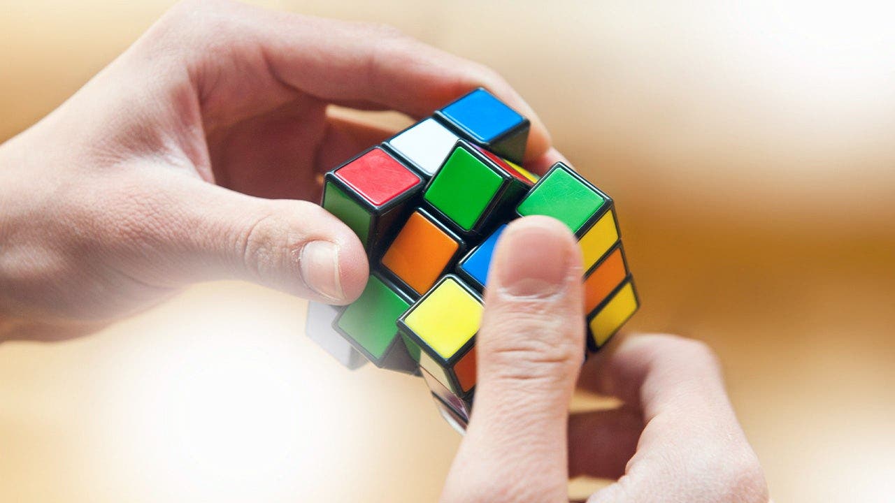 There's a new skydiving Rubik's Cube-solving champ in town, but there's ...