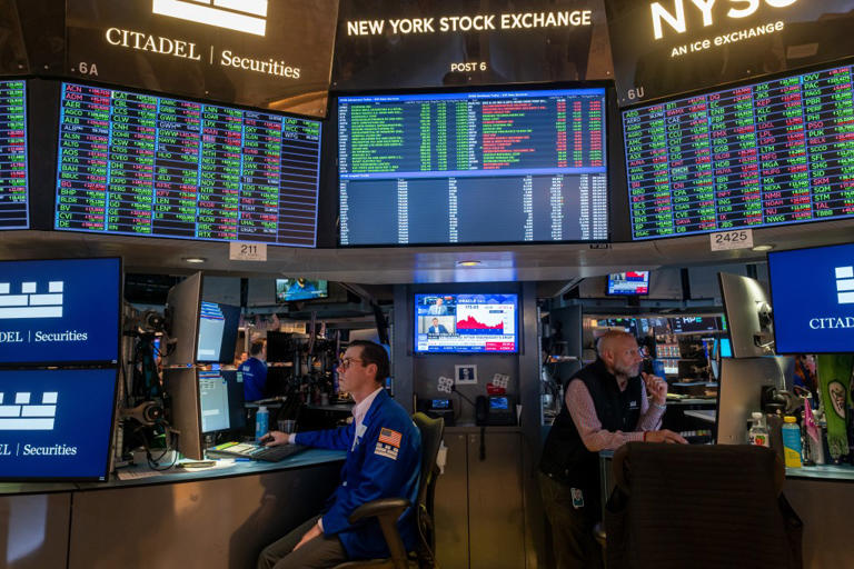 Dow jumps 900 points after Trump calls off Iran strikes, chip stocks ...